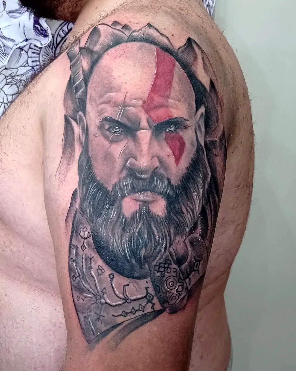 16 Bold and Striking Kratos Tattoo Ideas You’ll Love