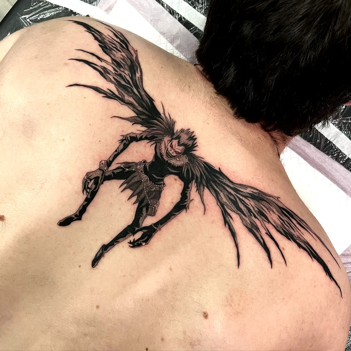16 Striking Ryuk Tattoo Ideas for Creative Fans