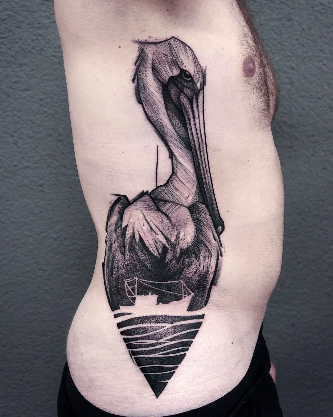 15 Striking Pelican Tattoos Ideas You’ll Love