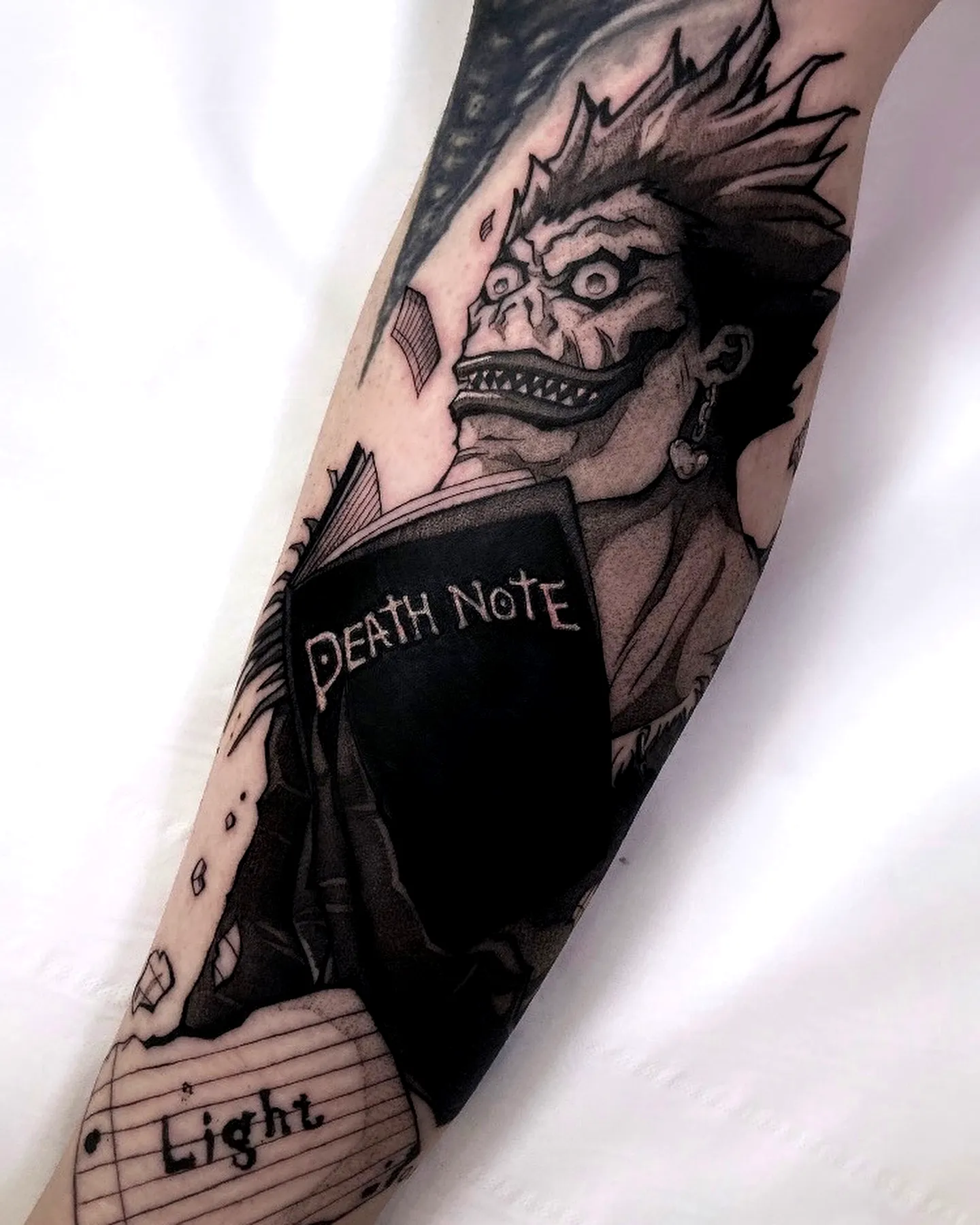 16 Striking Ryuk Tattoo Ideas for Creative Fans